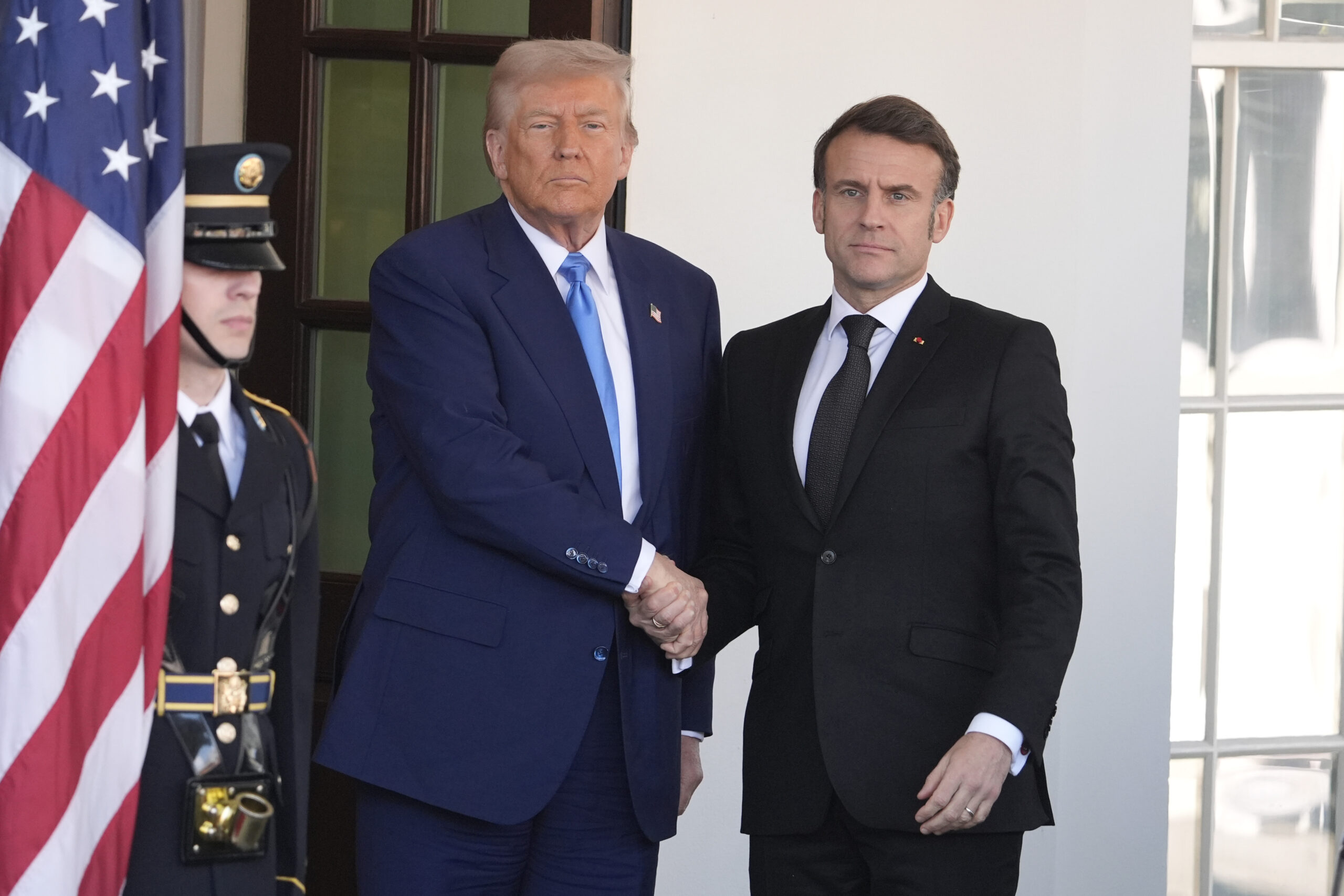 Trump Appears To Snub Macron With Breach of Diplomatic Protocol as He ...