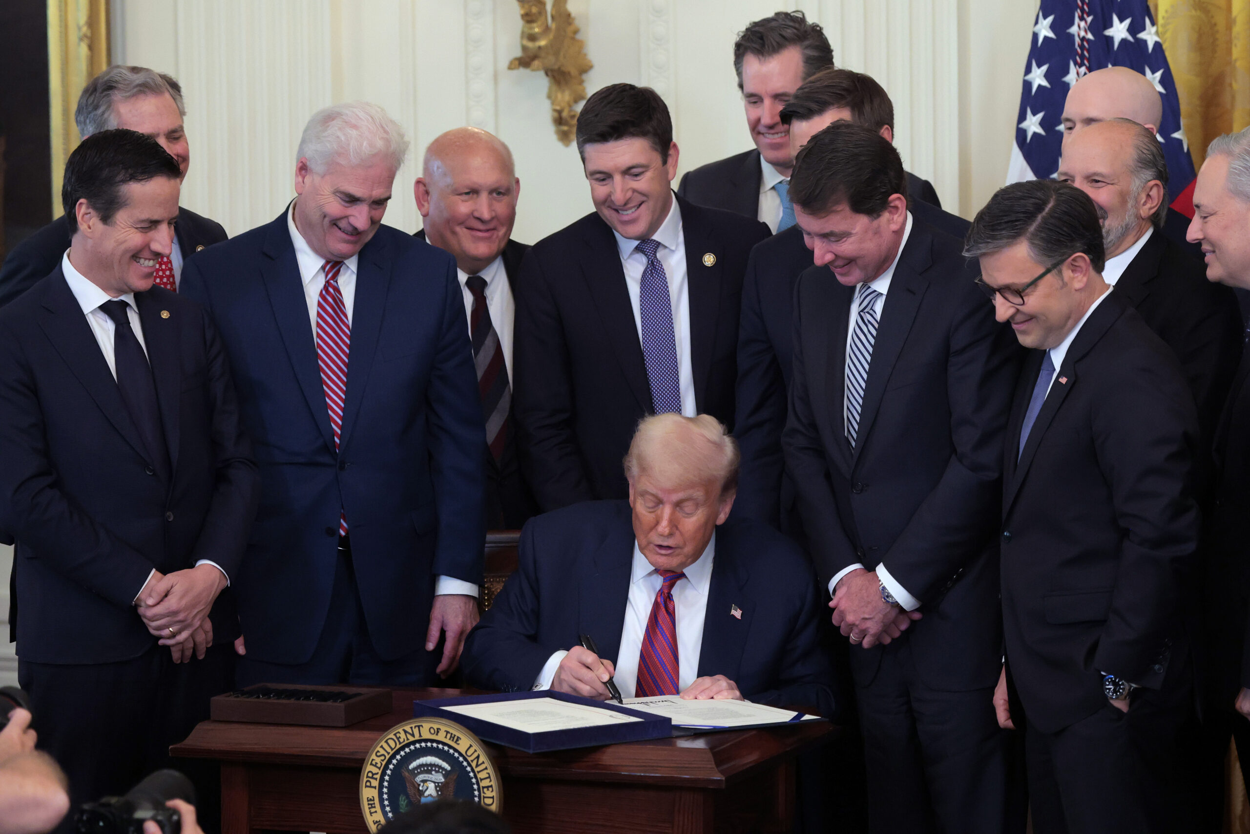 Trump Signs the First Major Federal Cryptocurrency Bill, the GENIUS Act ...